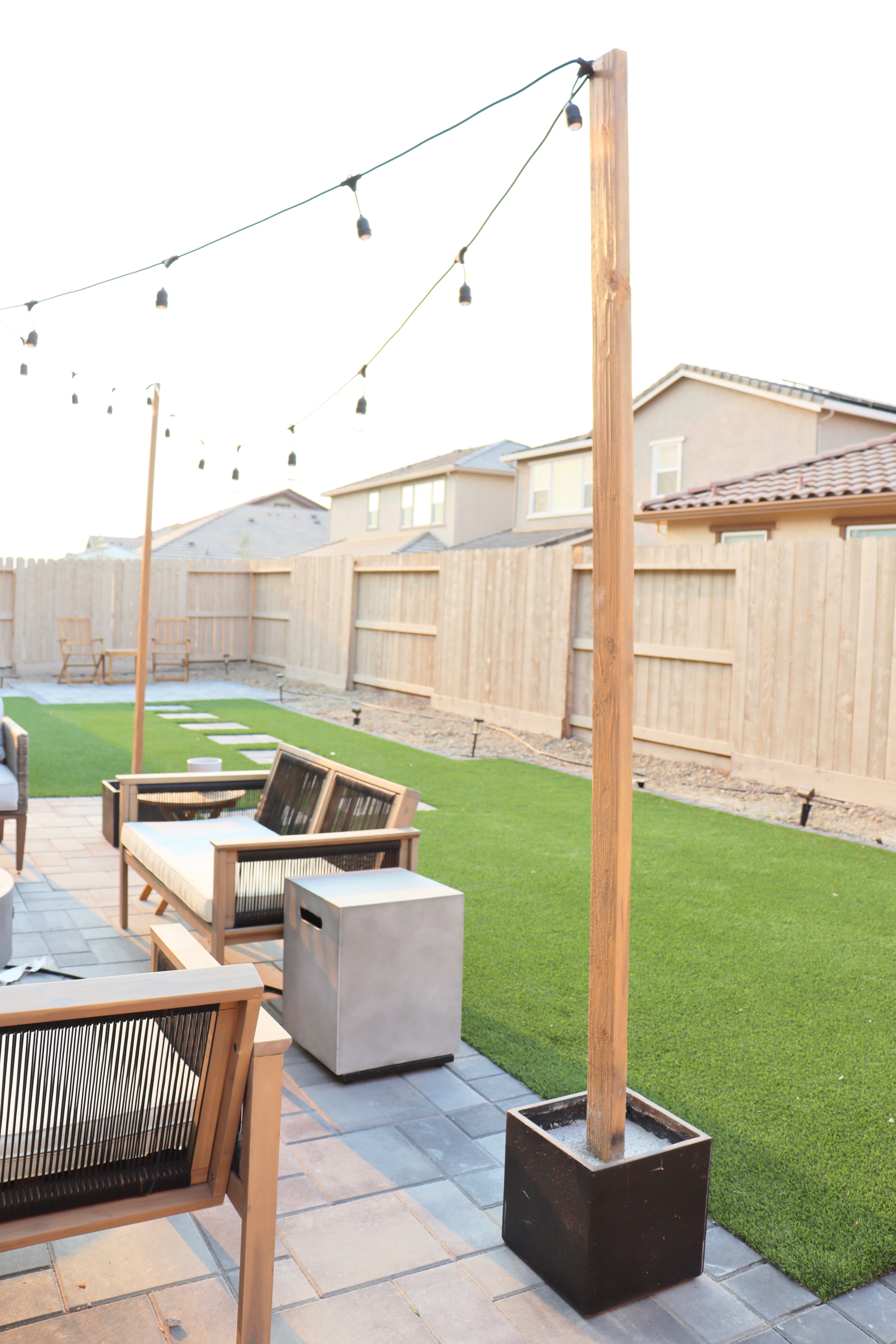 DIY String Light Posts – Home with Emily Jean